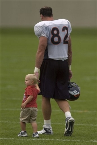 Denver Broncos Stephen Alexander and son take a walk